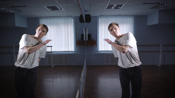 Dancer in White Shirt and Jeans Showing Modern Breakdancing in ...