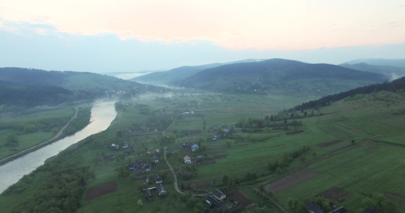 Village on a Hilly Area on the River Bank, Stock Footage | VideoHive