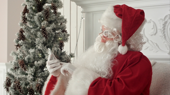 Laughing Santa Claus Reading Christmas Messages From Kids, Stock Footage