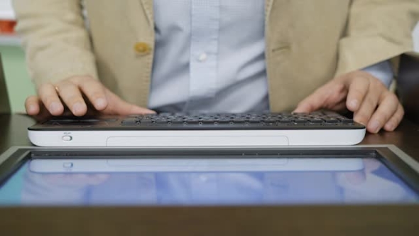 of Handsome Businessman Using Touchpad To Surf Web Pages Online, Stock ...