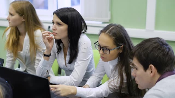 College Student Looking Into the Monitor and Talking, Stock Footage