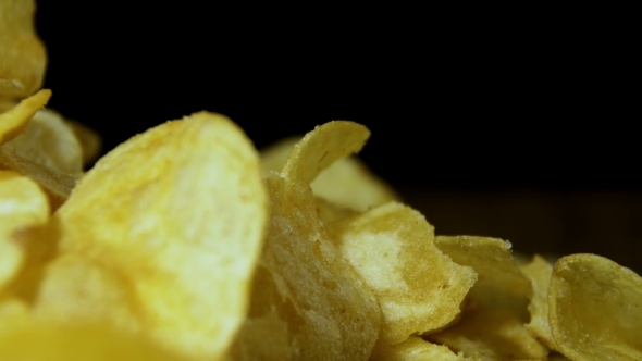Potato Chips Rotating On Black Background, Stock Footage | VideoHive