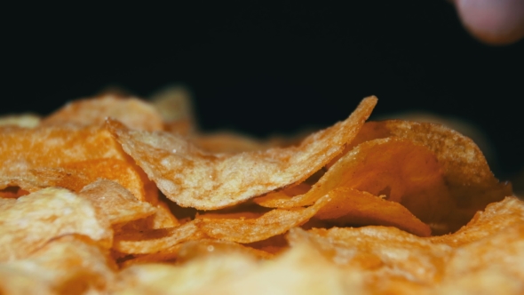 Potato Chips Rotating On Black Background, Stock Footage | VideoHive
