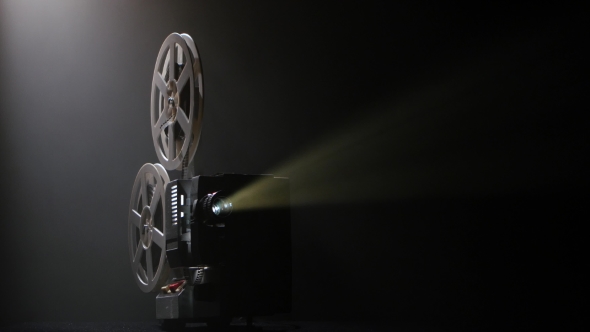 Projector Illuminated By Lights Broadcasts a Movies, Stock Footage