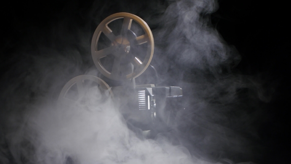 Old Projector Showing Film in the Smoke, Stock Footage | VideoHive
