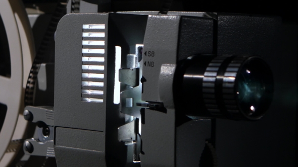 Movie Projector That Turns the Film Reel. Side View, Stock Footage