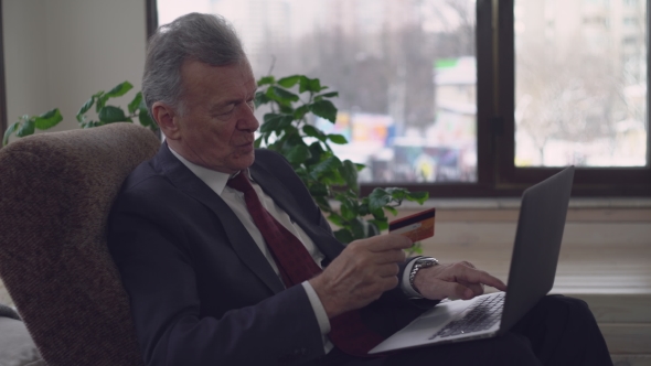 Respectable Gentleman Use Computer for Online Banking, Stock Footage