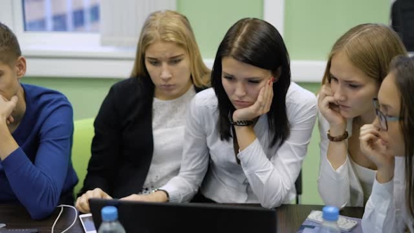University Students Preparing for the Exam. Students on Their Laptops ...