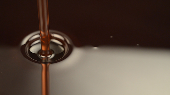 Red oily liquid pours beautifully, Stock Footage | VideoHive