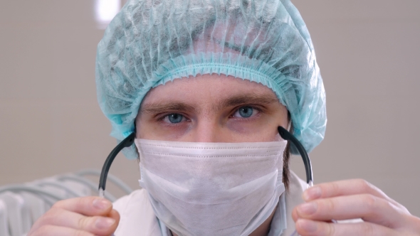 Doctor Wearing Glasses, Surgical Mask and Gloves, Medical Procedures ...