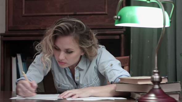 Furious Woman Stressingly Making Notes and Tearing Up Documents at Her ...