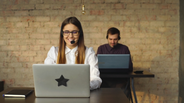 Two Customer Support Operator Working in a Call Center, Stock Footage
