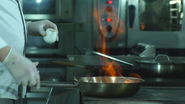 A Chef Flipping Vegetables in a Frying Pan, Stock Footage | VideoHive