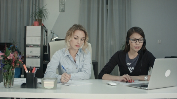 Two Women Working Together in the Office, Stock Footage | VideoHive