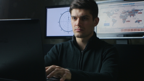 IT Professional Programmer Is Working on Computer in Cyber Security ...