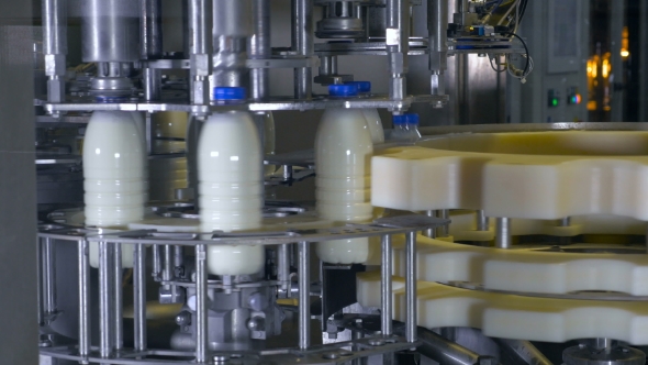 Plastic Bottles Filling with Milk, Stock Footage | VideoHive