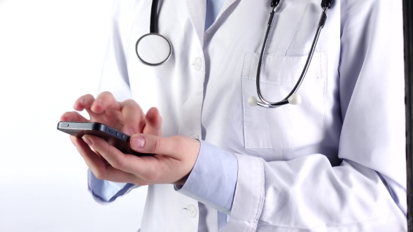Doctor Standing and Holding Mobile Phone, Wearing Stethoscope, on White ...