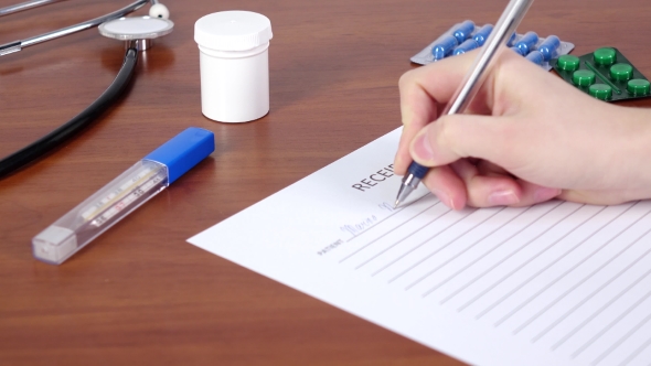 Doctor Writing a Receipt for Patience, Stock Footage | VideoHive