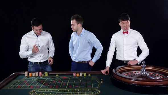 Three Guys Playing Roulette in the Casino. Black, Stock Footage | VideoHive