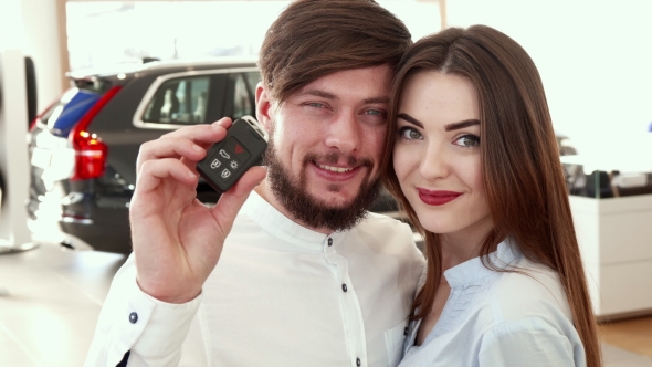 Man Shows Car Key at the Dealership, Stock Footage | VideoHive