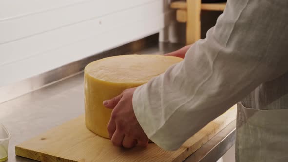 Cheesemaker Rubs Cheese with Olive Oil, Stock Footage | VideoHive