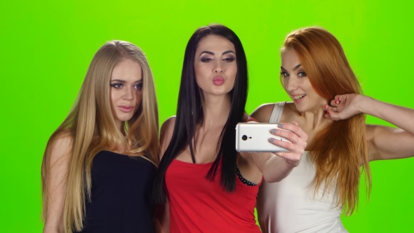 Green Screen. Girls Pose for the Camera of the Smartphone, Stock Footage
