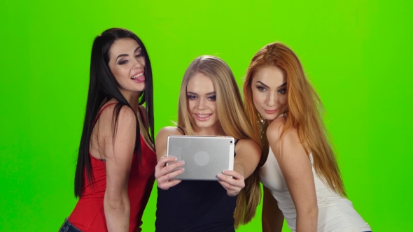 Green Screen. Girls Pose for the Camera of the Tablet, Stock Footage