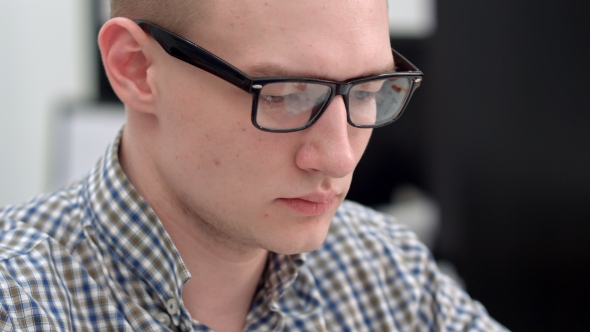 Young Man in Glasses Working in the Office, Stock Footage | VideoHive