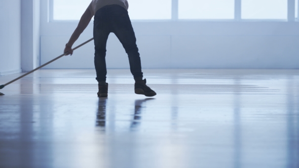 Man Cleaning the Floor in an Exercise Gym, Stock Footage | VideoHive
