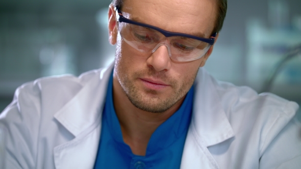 Scientist Face. Portrait of Researcher Working in Safety Glasses, Stock ...