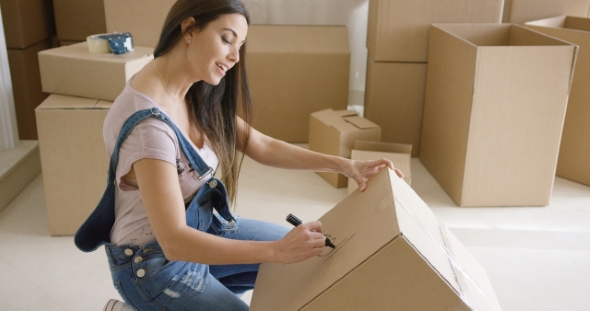 Attractive Woman Moving House and Packing, Stock Footage | VideoHive