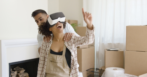 Happy Young Couple Doing Virtual Tour in New Apartment, Stock Footage