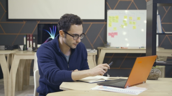 Creative Man in Glasses Using Laptop at Workplace, Stock Footage ...