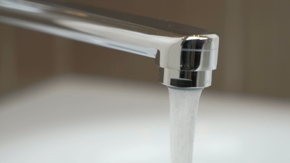 Water Flows Strong Stream of Chrome-plated Faucet, Stock Footage ...