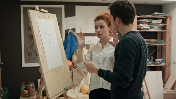 Student and Art Teacher During Painting Lesson, Stock Footage | VideoHive