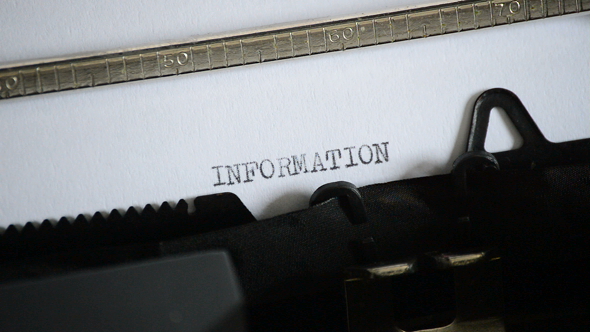 Typing the Word INFORMATION with an Old Manual Typewriter, Stock Footage