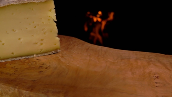 Slices of Cheese Falling on a Wooden Board, Stock Footage | VideoHive