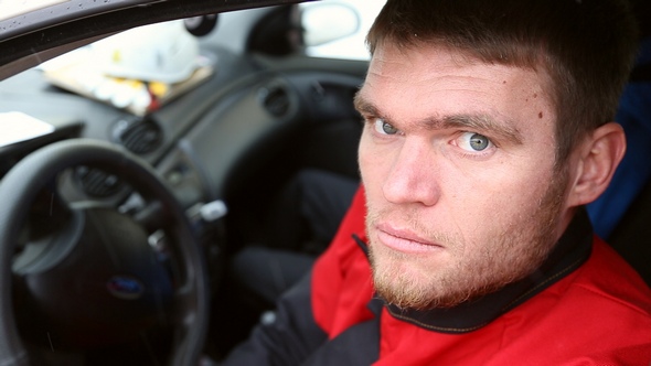 The Car Driver Anxiously Looking at the Camera, Stock Footage | VideoHive