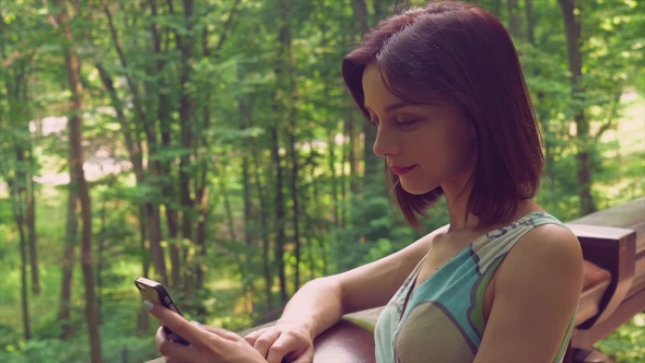 A Brunette Girl Is Texting., Stock Footage | VideoHive