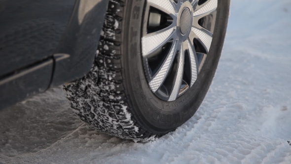 The Wheel Slips on the Snow, Stock Footage | VideoHive