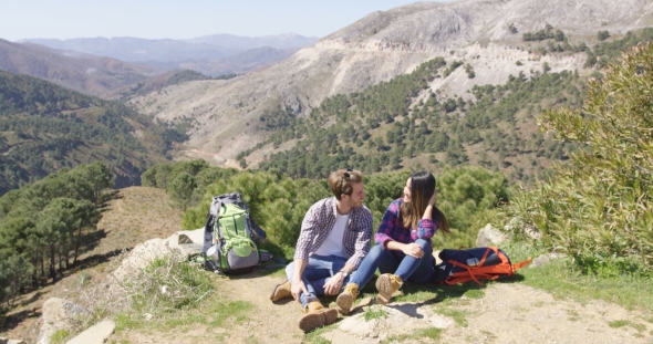 Two People Taking Rest While Hiking, Stock Footage | VideoHive
