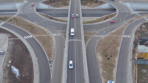High Speed Road Intersection Running Through Fields and Meadows, Drone ...