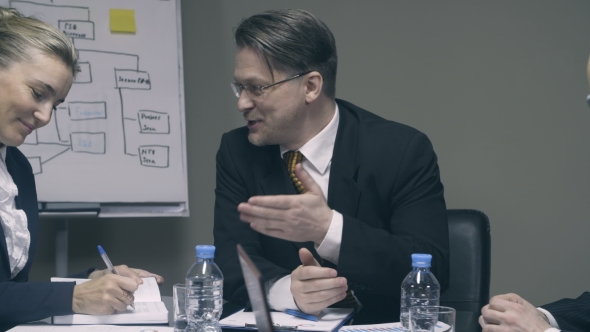 Cheerful Boss Talking with Colleagues, Stock Footage | VideoHive