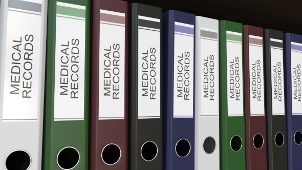 Line of Multicolor Office Binders with Medical Records Tags, Motion ...
