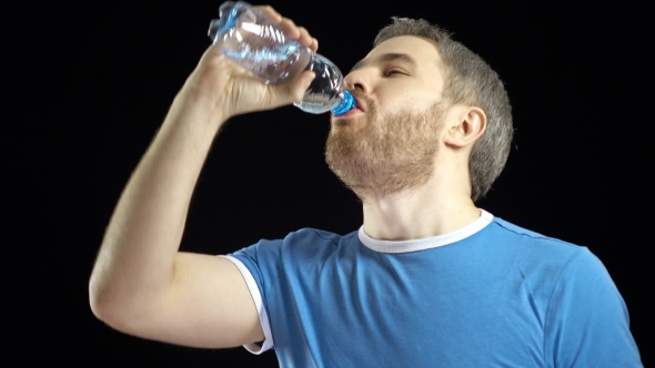 Handsome Gray Haired Man in Blue T-shirt Drinking Water From Pastic ...