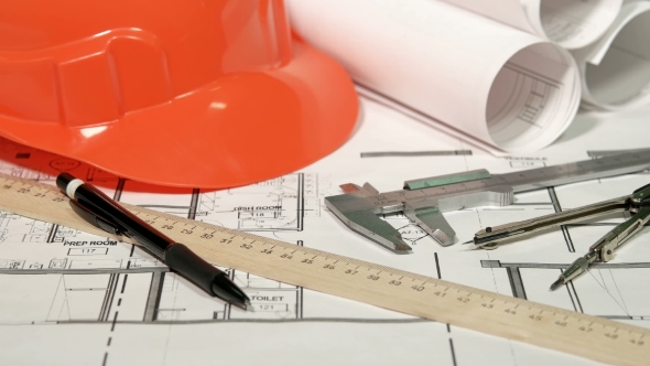 Engineer's Desk with Drawings, Helmet, Ruler, Pencil, Stock Footage