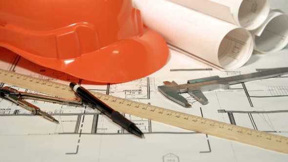 Engineer's Desk with Drawings, Helmet, Ruler, Pencil, Stock Footage