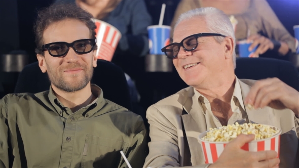 Two Men Watching 3D Film at the Movie Theater, Stock Footage | VideoHive