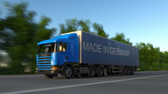 Speeding Freight Semi Truck with MADE IN GERMANY Caption on the Trailer ...