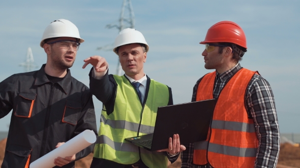 Men on Building Site Discussing the Blueprint, Stock Footage | VideoHive